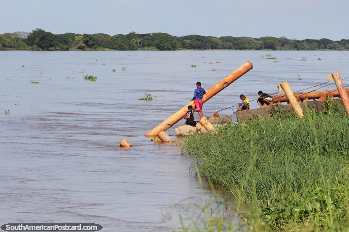 Boys beside the great Apure River in San Fernando de Apure. Photo from ...
