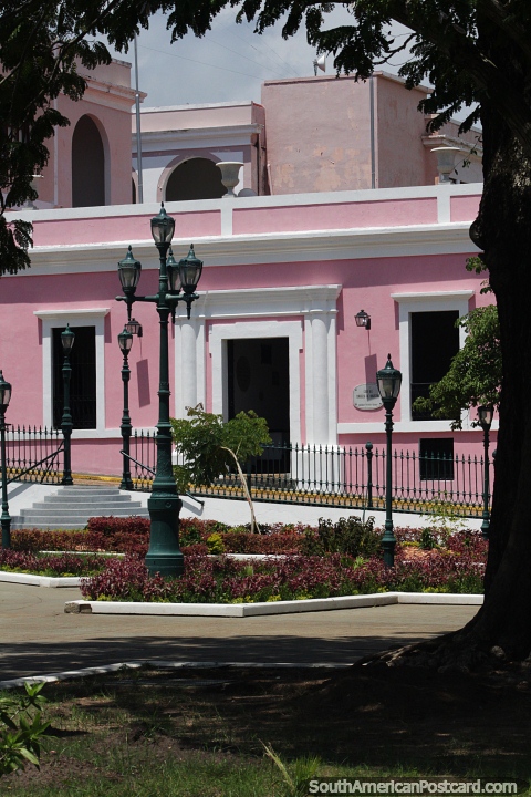 Pink building beside Plaza Bolivar in Ciudad Bolivar. Photo from ...